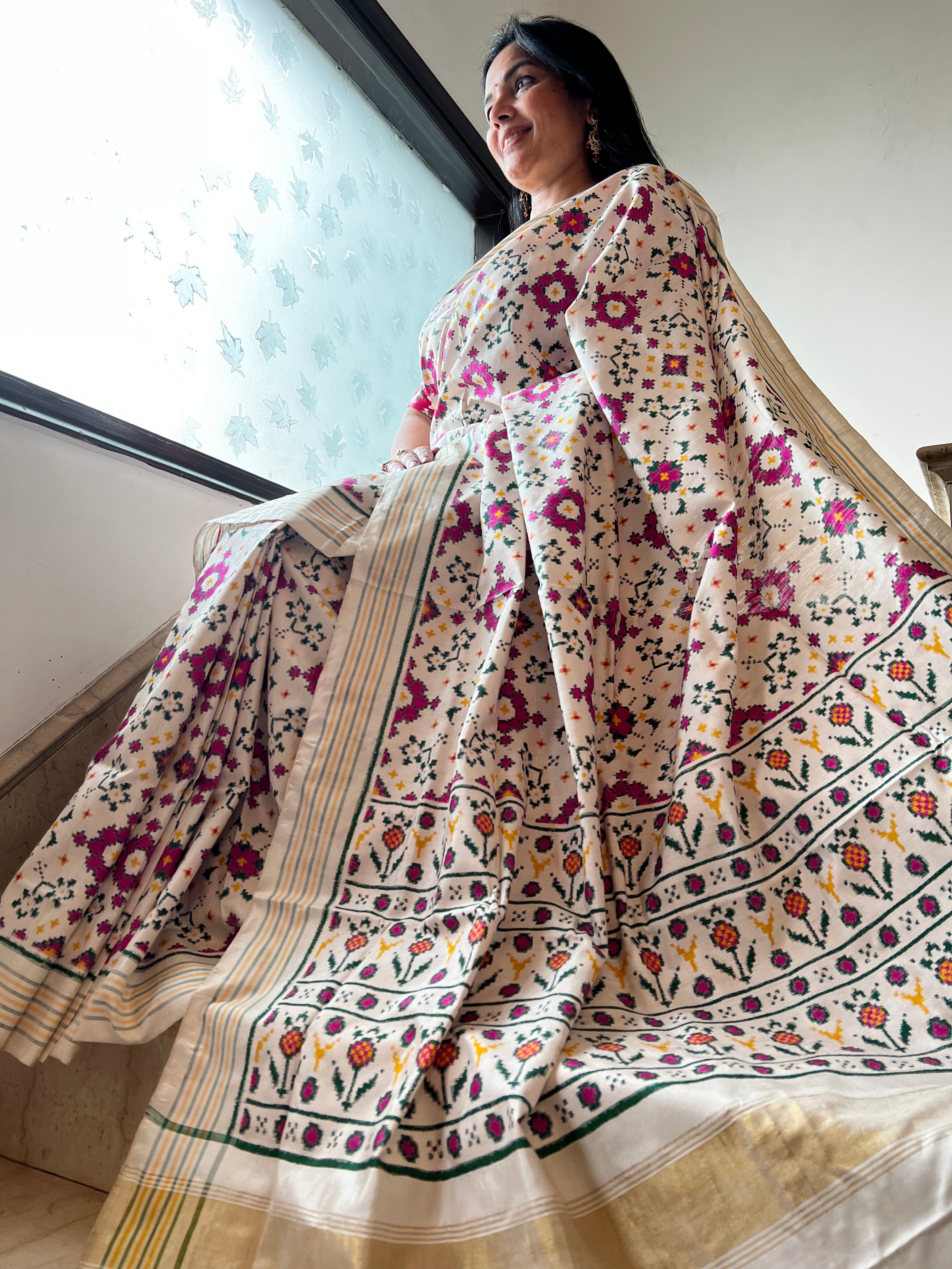 Pristine White Double Ikat Patan Patola with the timeless Navratan des – sohumsutras